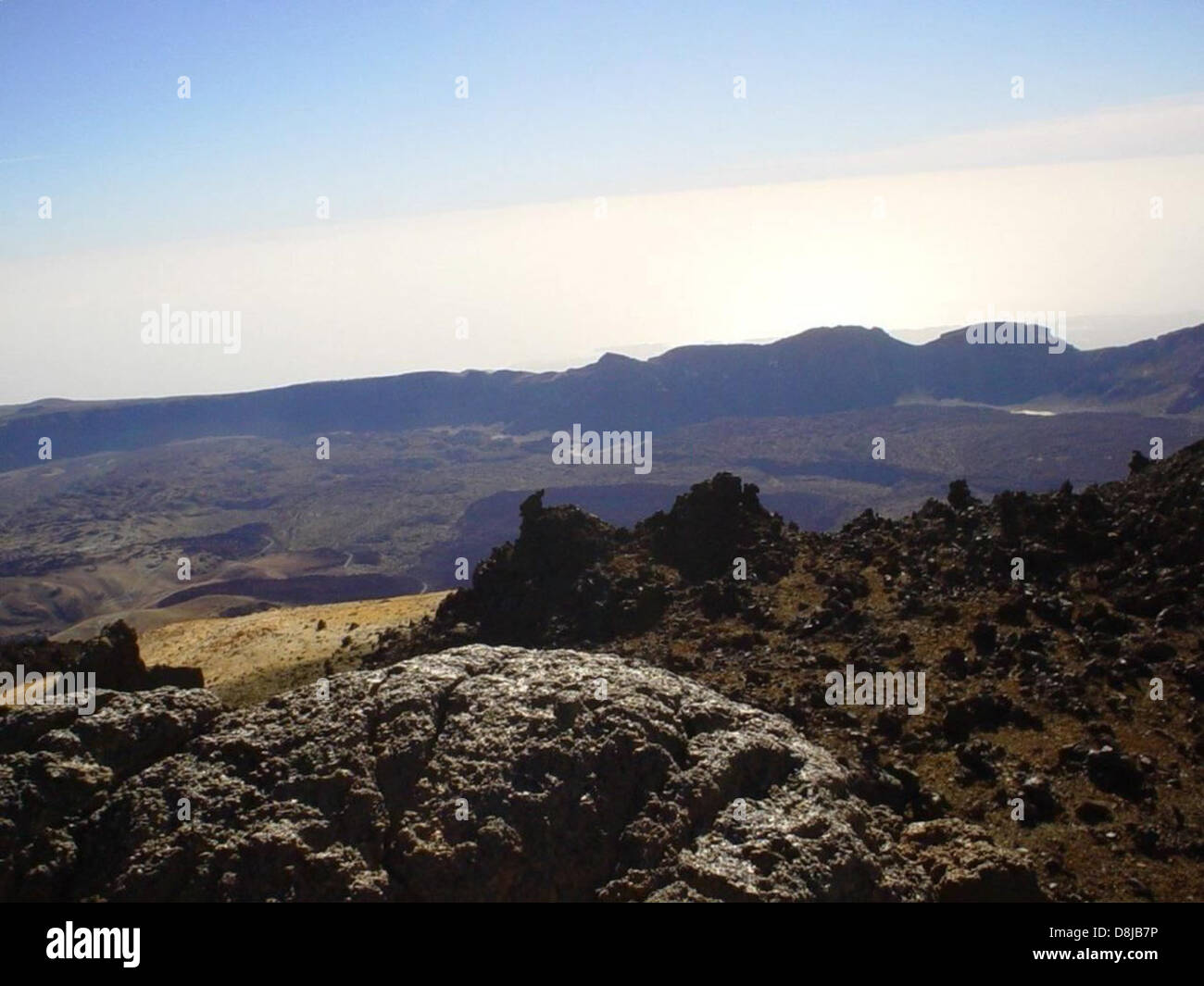 The interior of a volcanic crater, showing the rugged terrain and ...