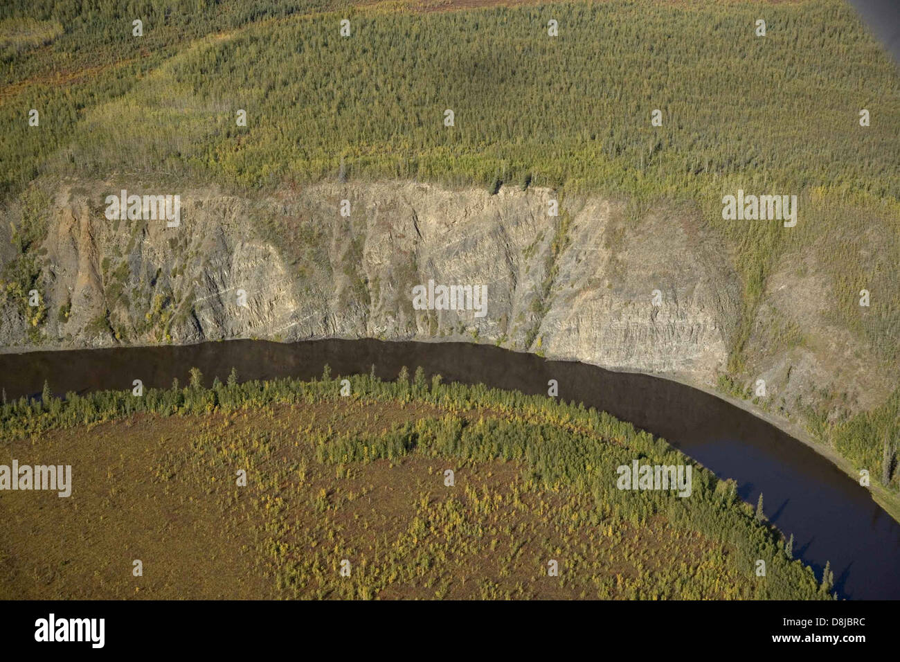 This aerial view captures the winding Kanuti River flowing through ...