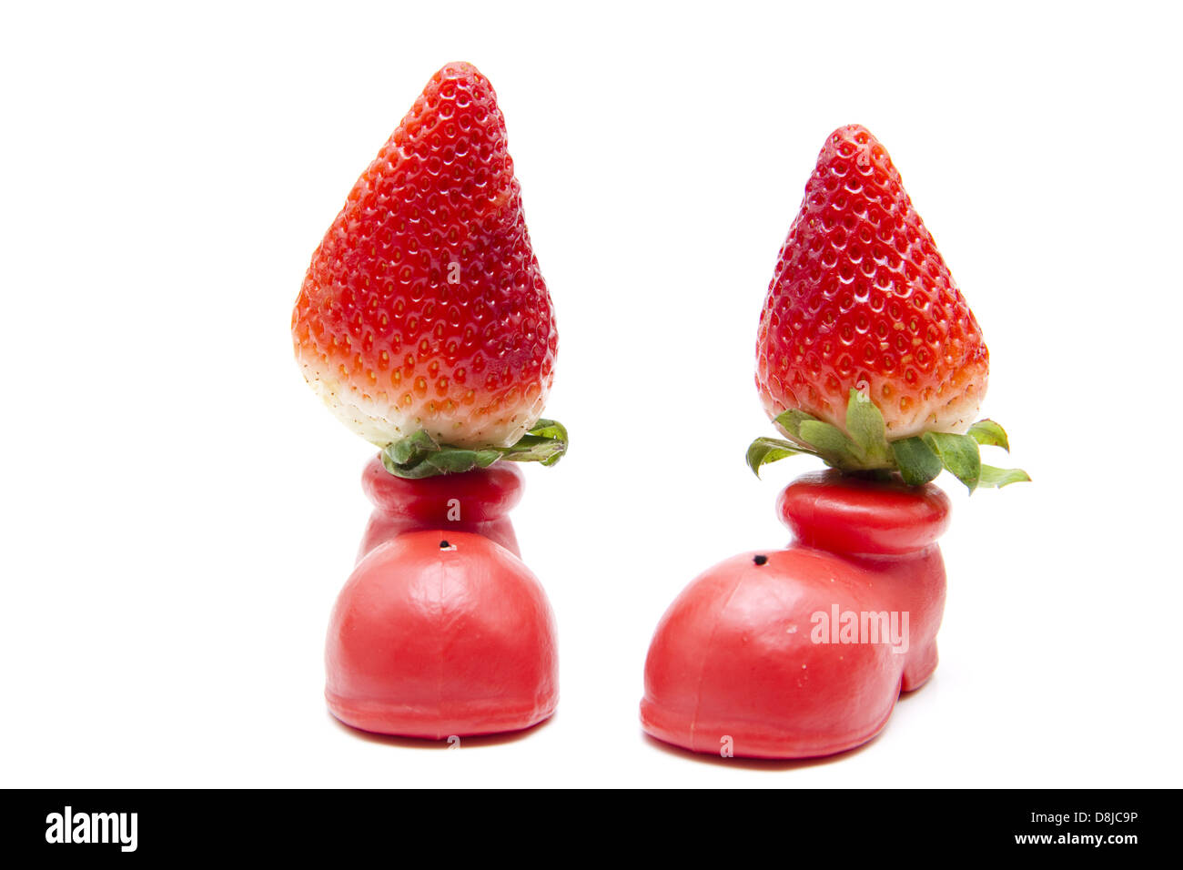 Strawberry with shoes Stock Photo - Alamy