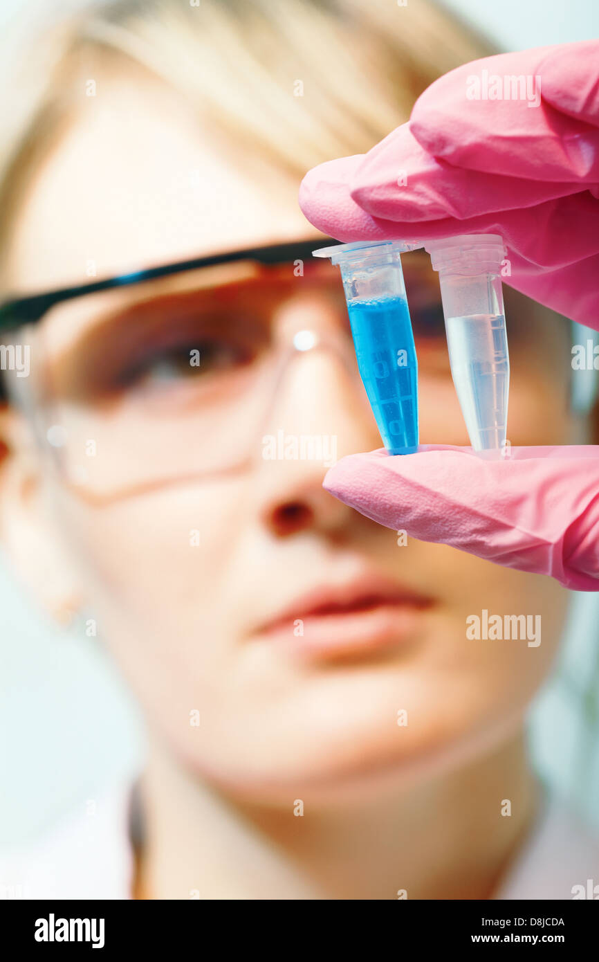 Portrait woman in protective gloves hi-res stock photography and images ...