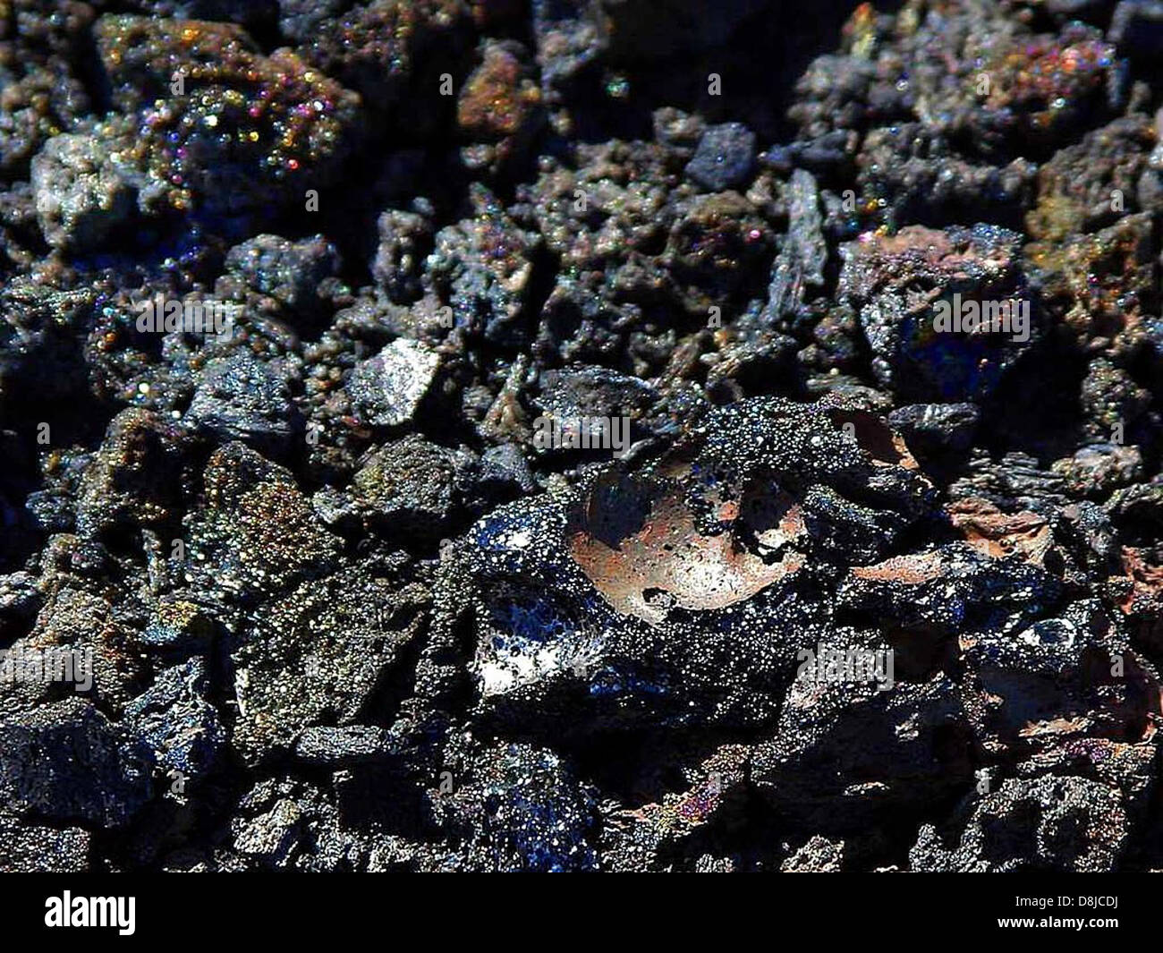 A photo capturing the iridescence of lava during a volcanic eruption ...