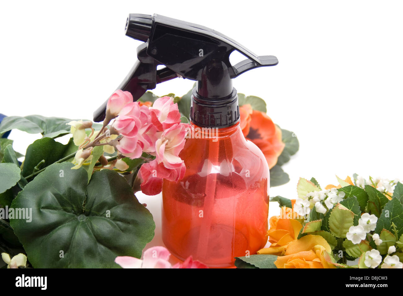 Spray bottle with flowers Stock Photo - Alamy