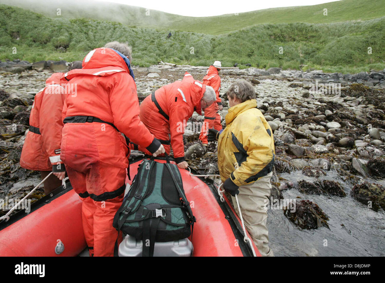 A scene showing male individuals exiting a boat in a ranger service, possibly for a guided tour ...