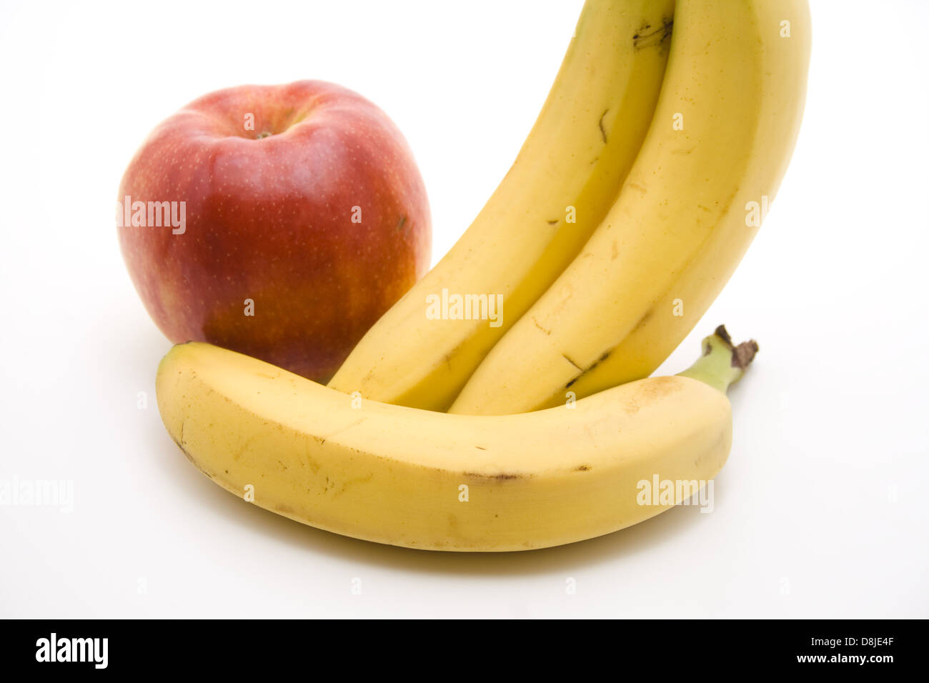 Bananas and apple Stock Photo - Alamy