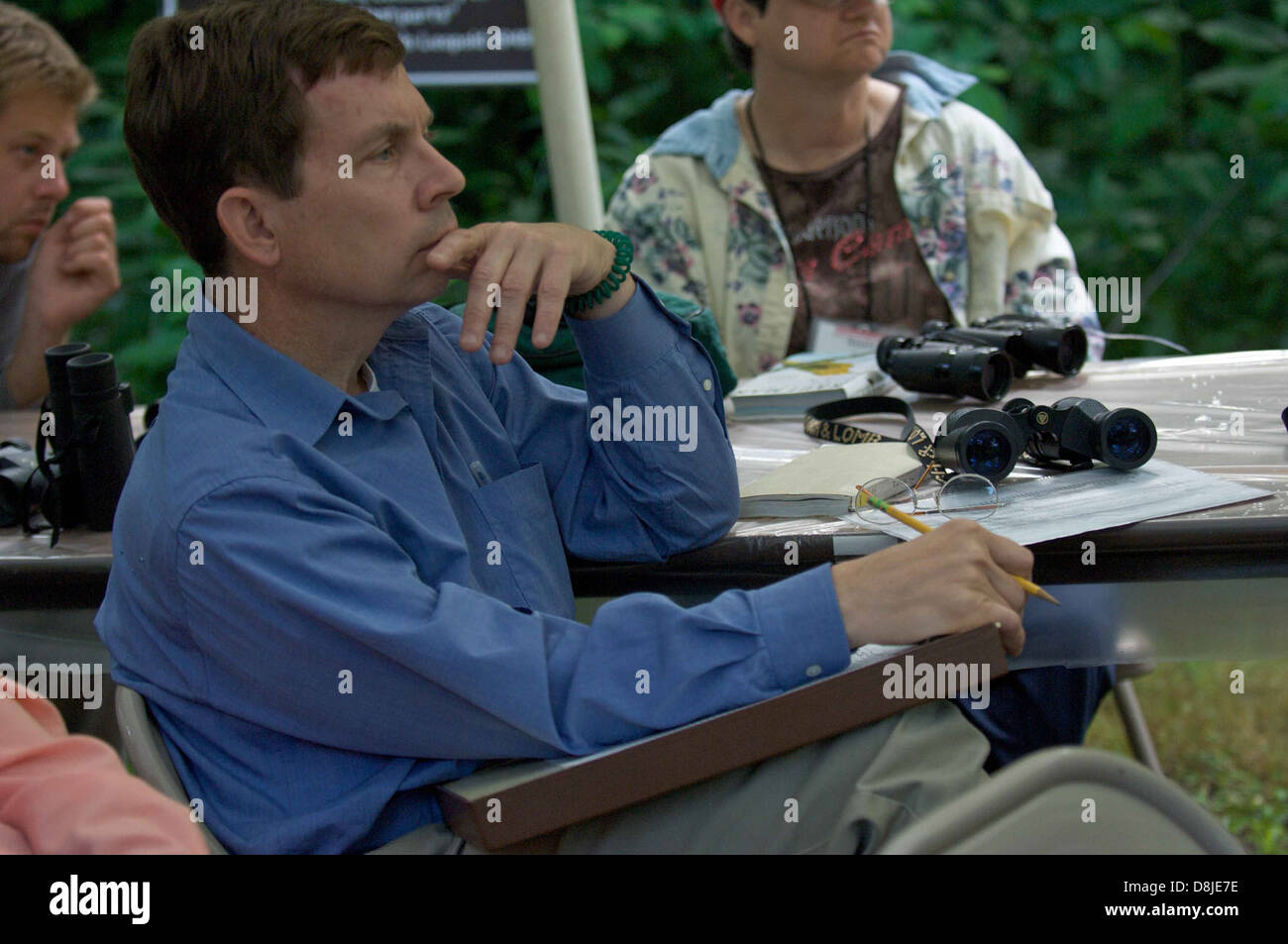 Man intently listening during class Stock Photo - Alamy