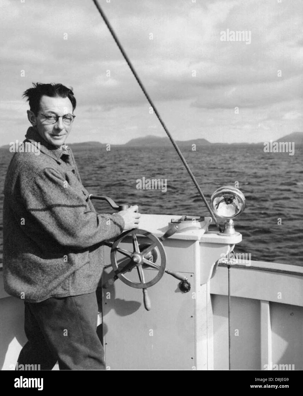 Man on boat Black and White Stock Photos & Images - Alamy