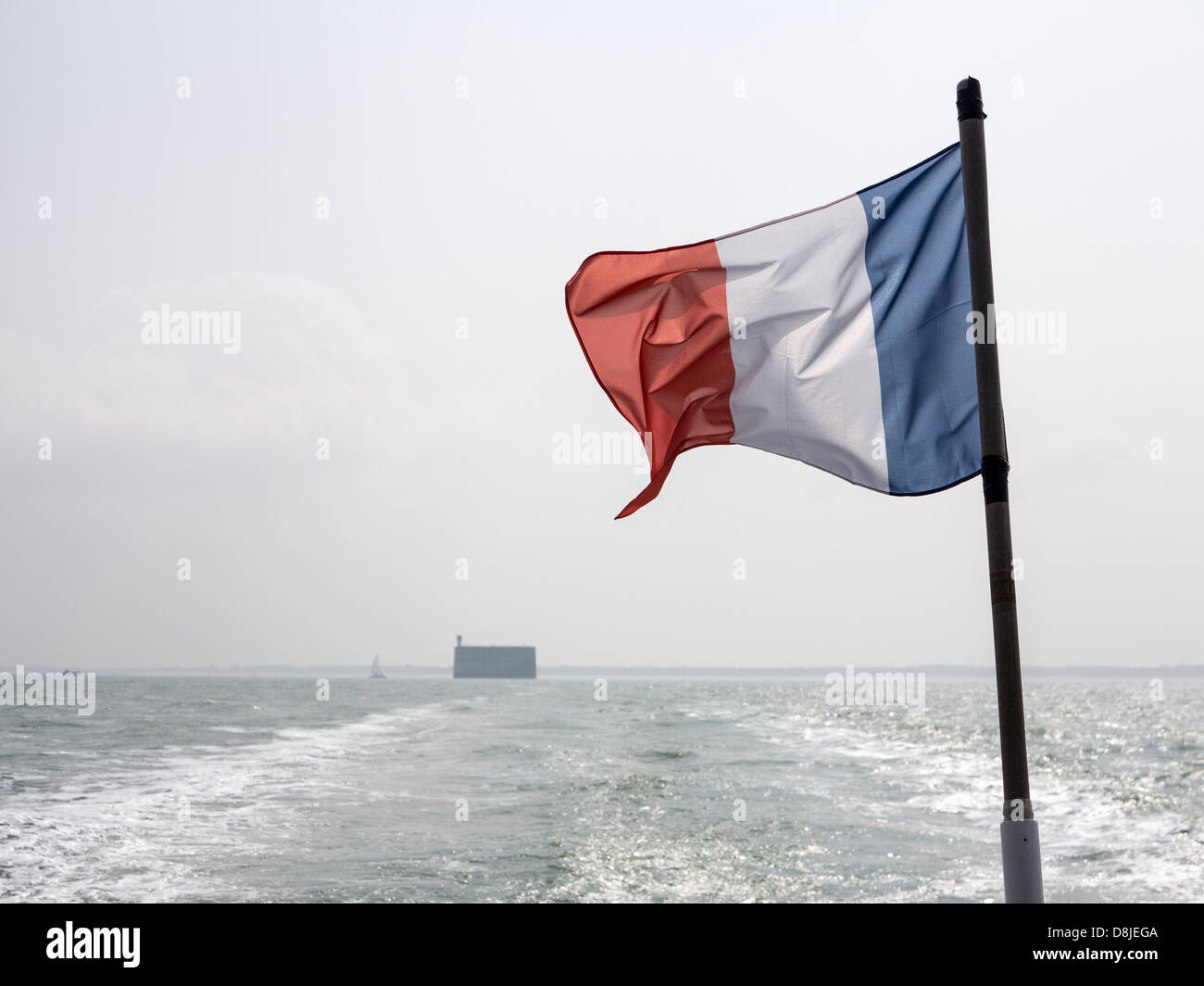 A view of Fort Boyard and the French flag on a tourist boat, off Fouras ...