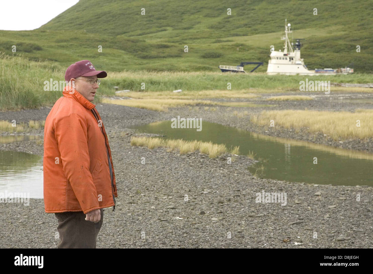 Man on pond Stock Photo - Alamy