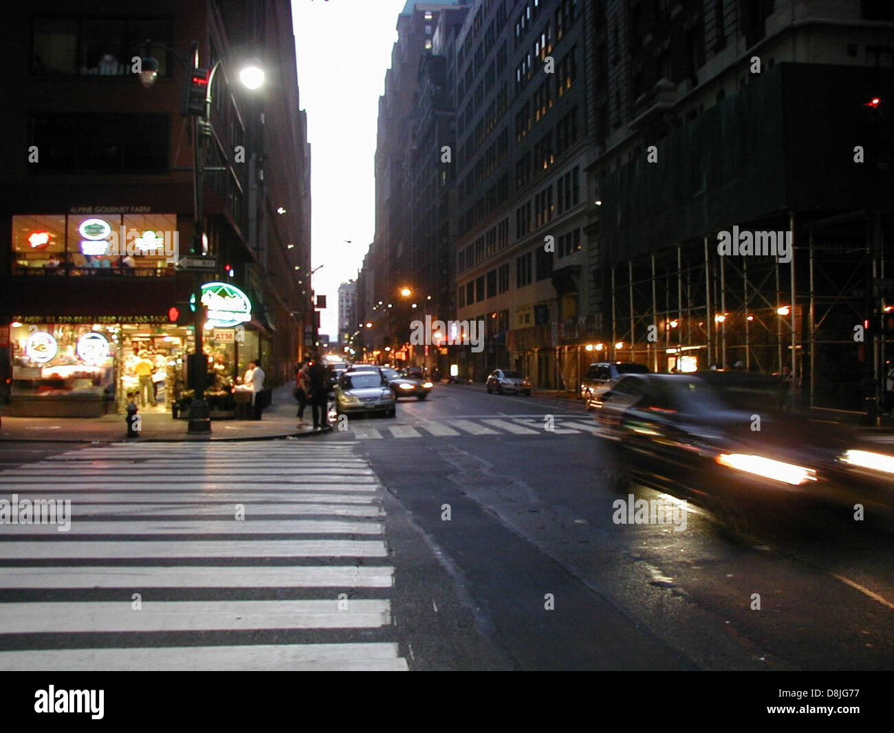 Midtown Manhattan is bustling with activity under the intense heat of a ...