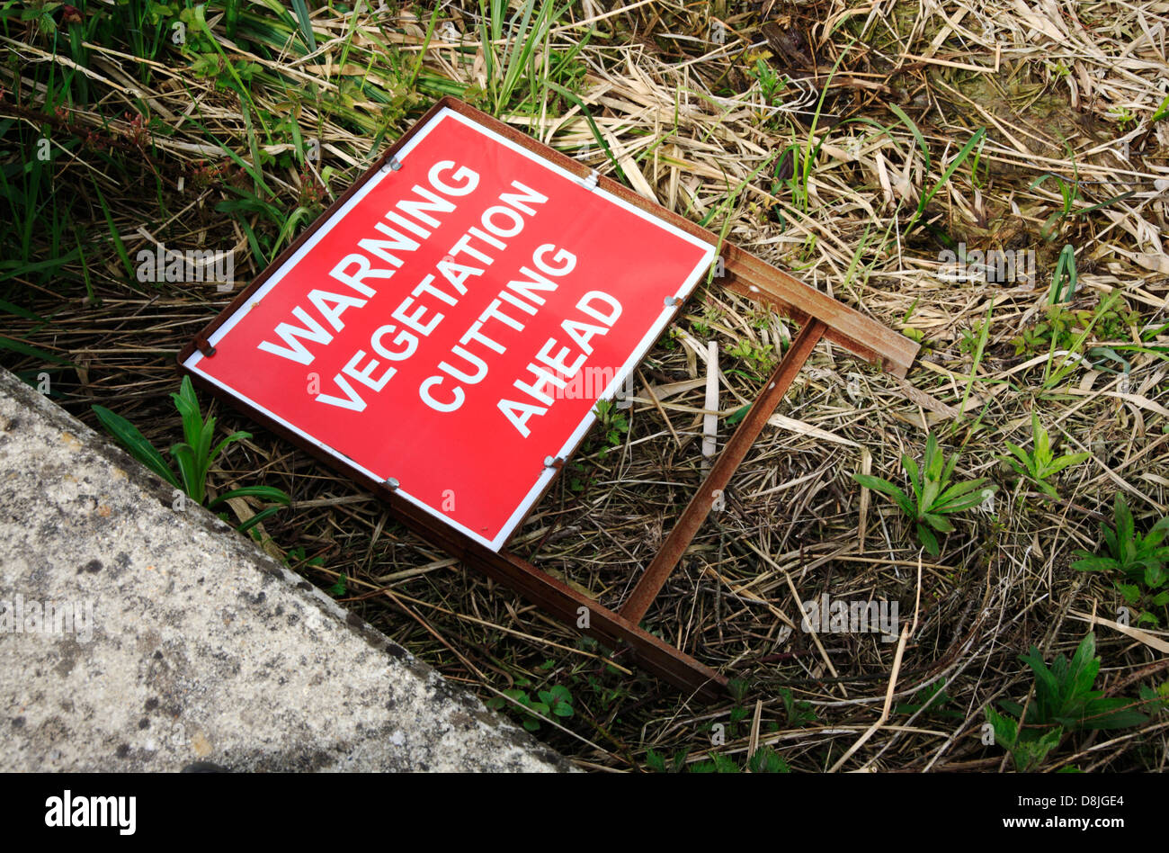 A sign warning of vegetation cutting by the staithe at Rockland St Mary ...