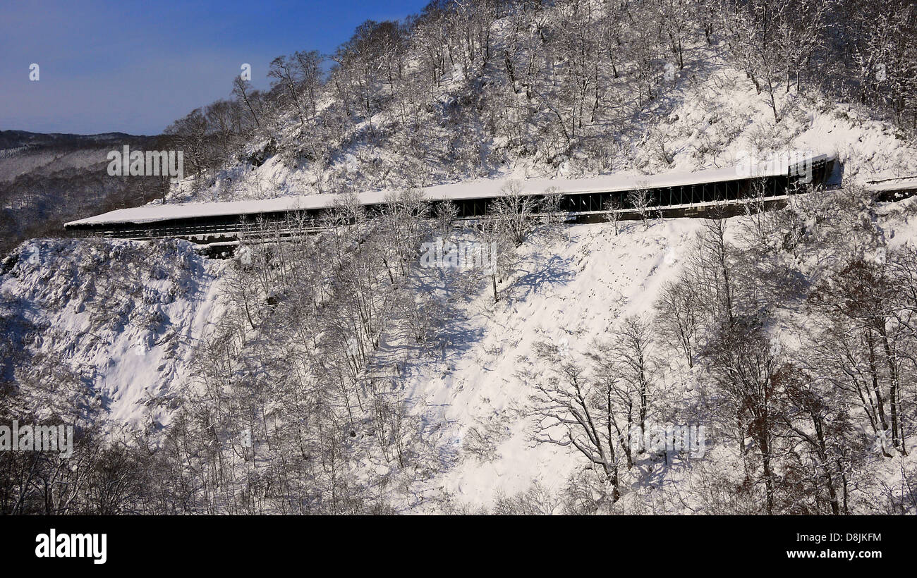 A sheltered road R341 cutting across the mountain to Tamagwa Onsen ...
