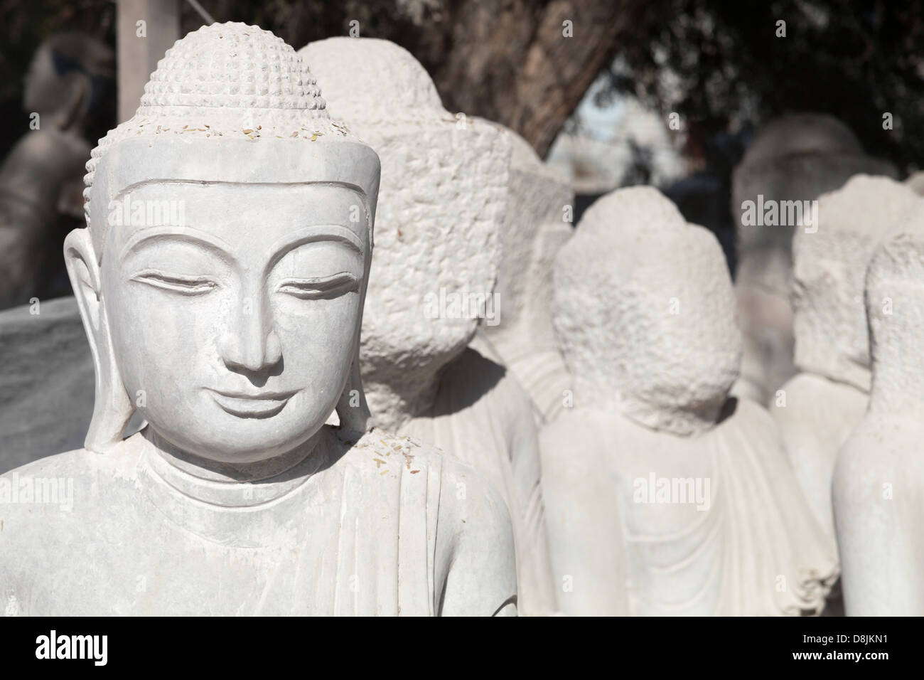 Stone carving workshop in Mandalay, Myanmar- completed and faceless ...
