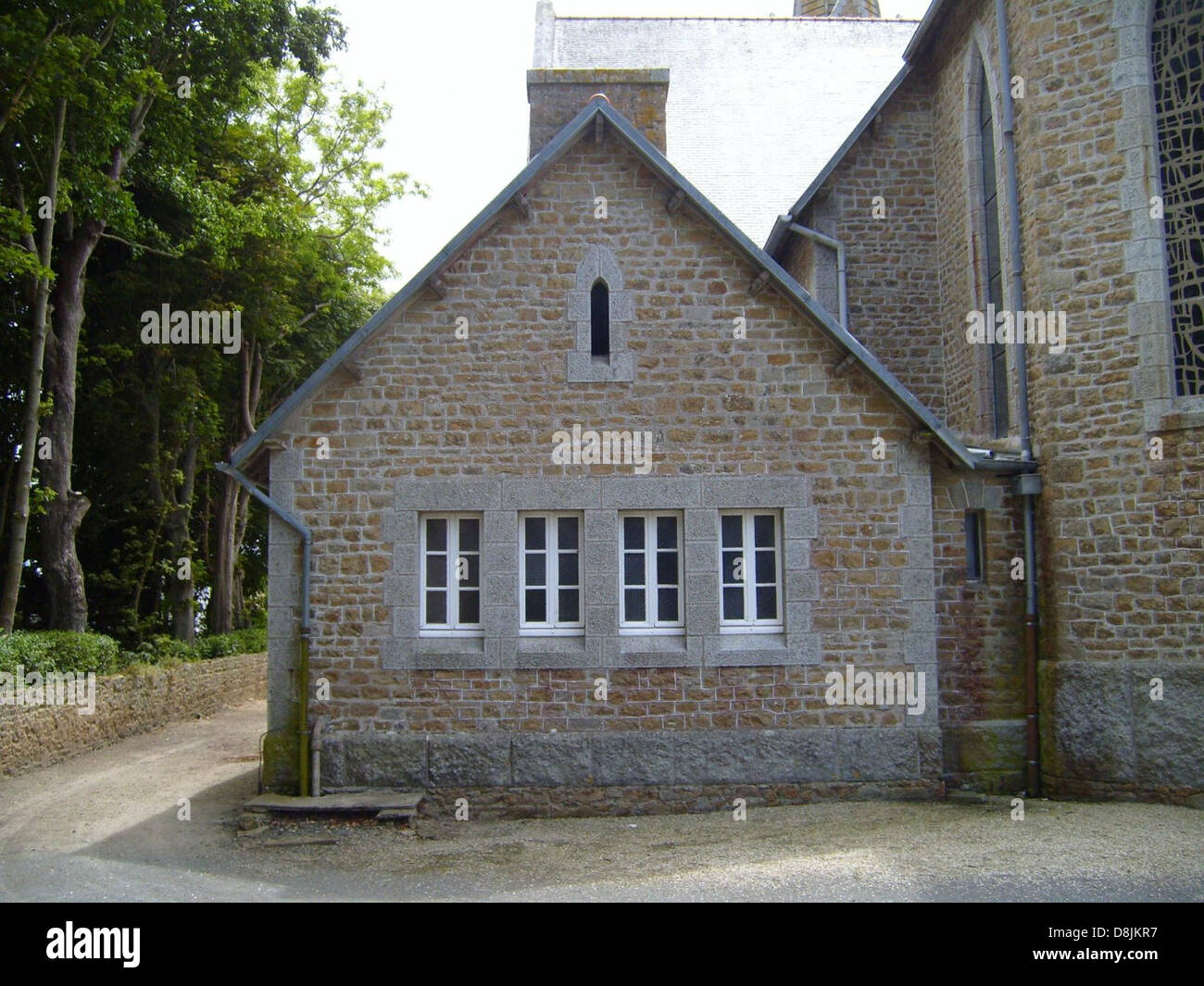 An old-style masonry house with traditional construction. The image ...