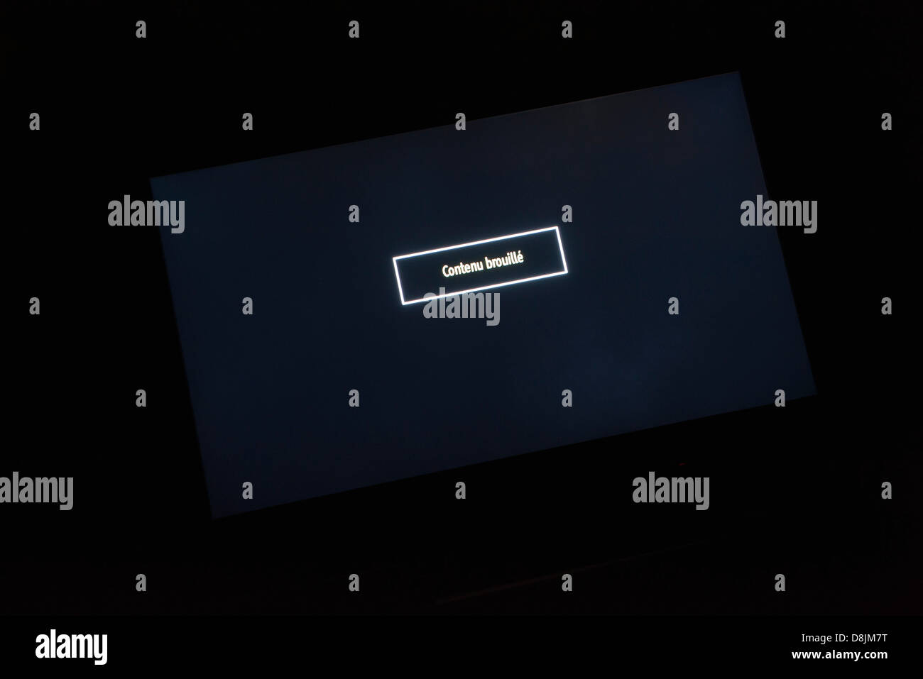 Monitor displaying "scrambled content" in French Stock Photo - Alamy