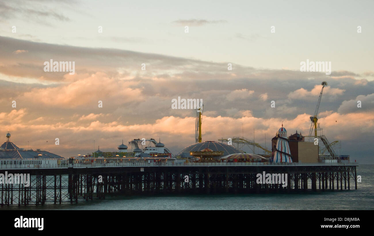 Brighton Pier fairground rides, clouds, morning Stock Photo - Alamy