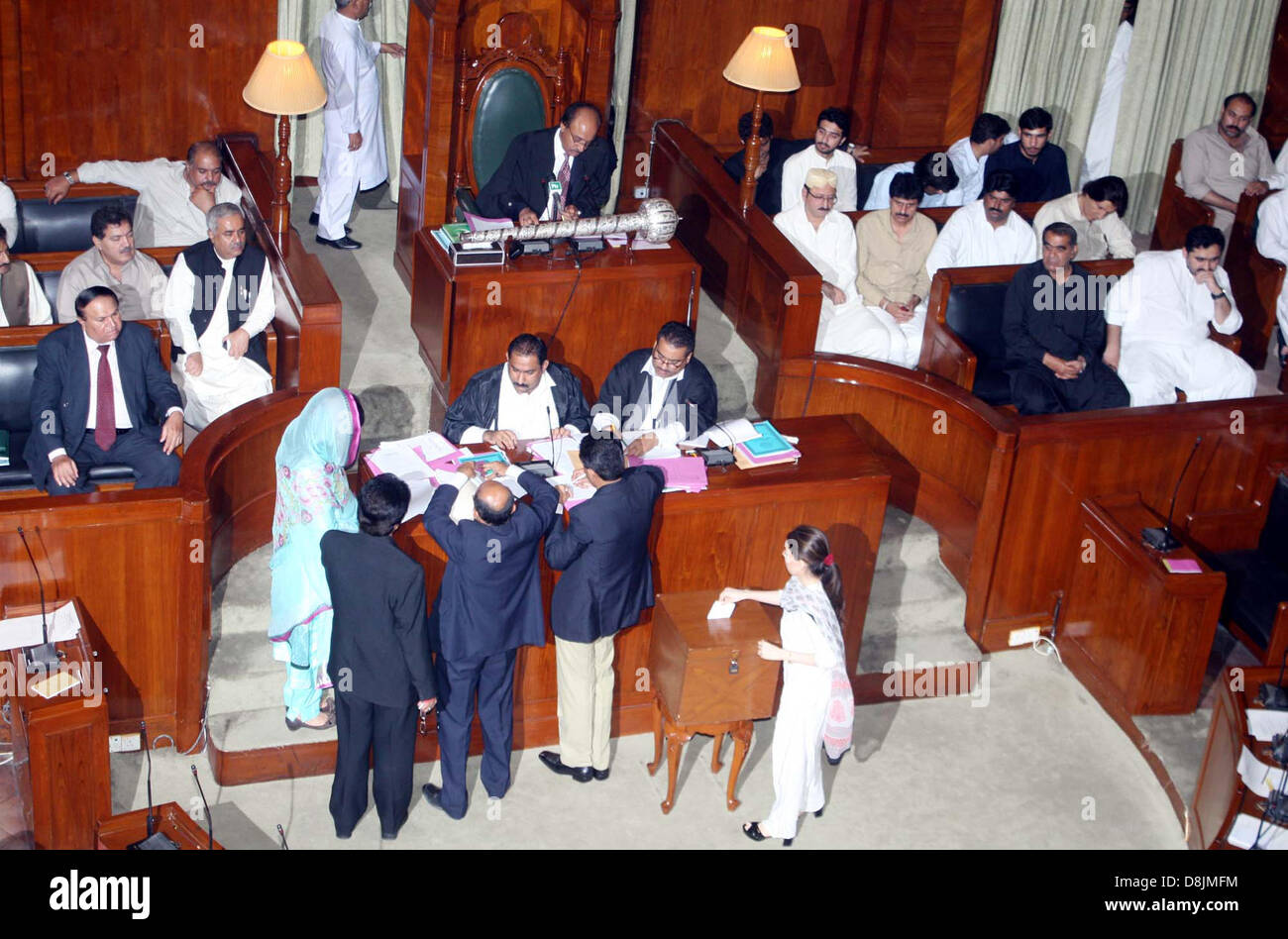Newly-elected Sindh provincial assembly members casting their votes for ...