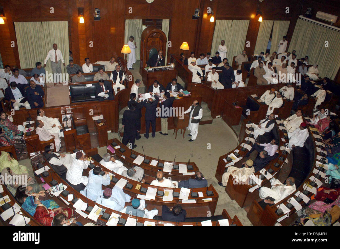 Newly-elected Sindh provincial assembly members casting their votes for ...