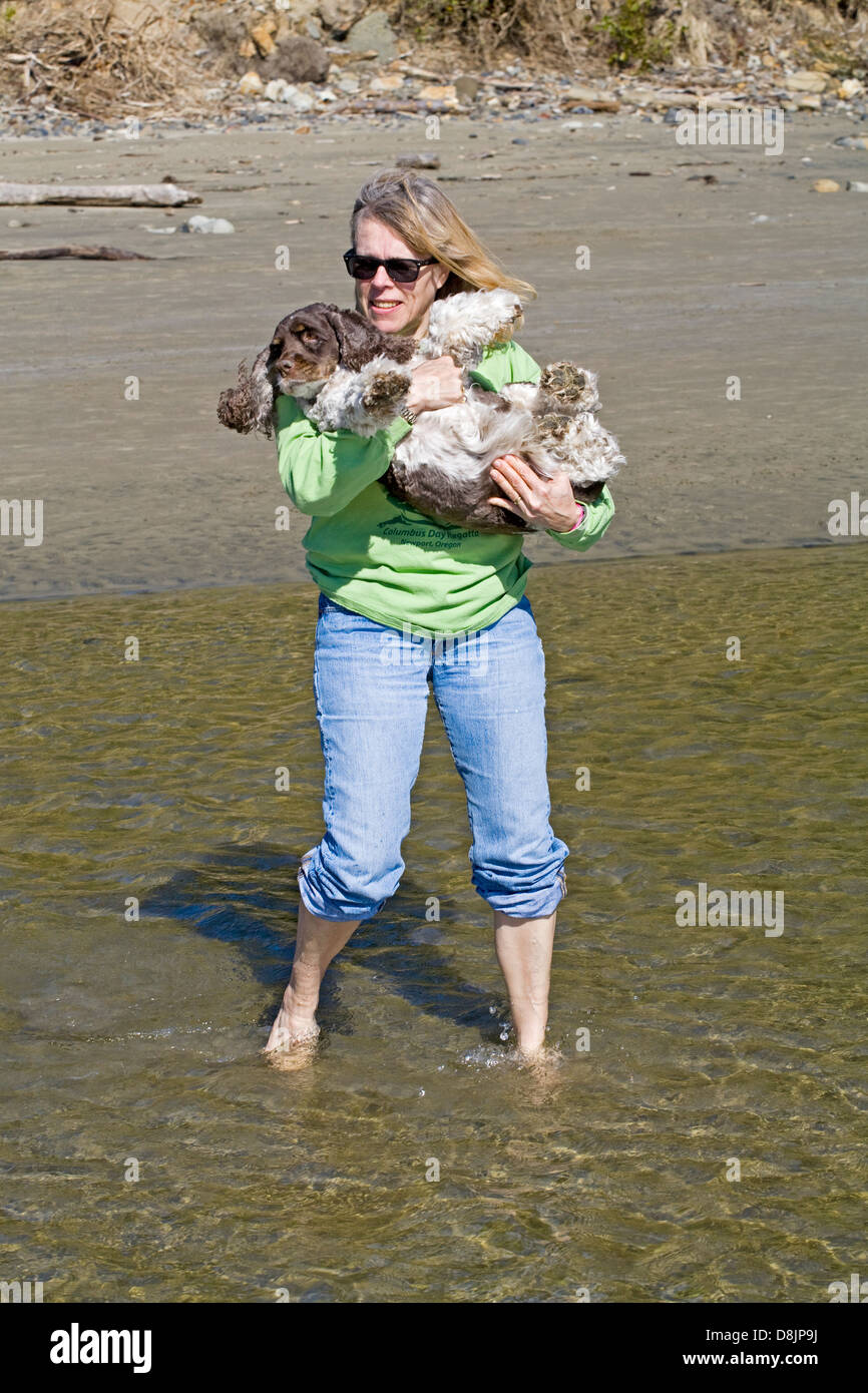 Carrying her dog hi-res stock photography and images - Alamy