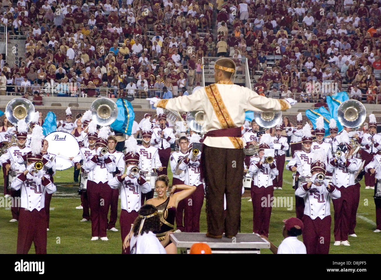 Florida State bandleader directing band Stock Photo - Alamy