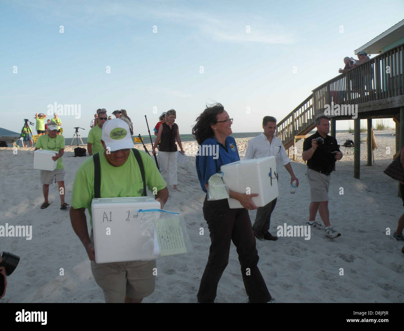 People wear plastic containers boxes Stock Photo - Alamy