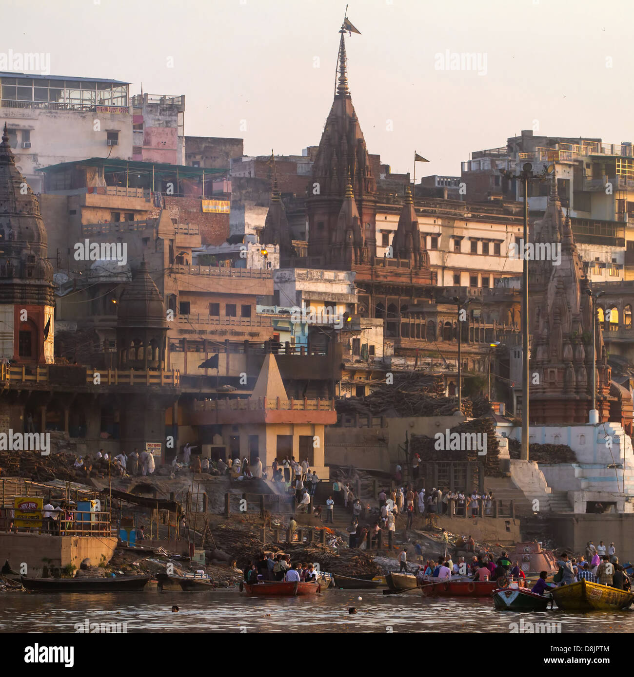 Manikarnika Ghat on the banks of Ganges river, Varanasi Stock Photo - Alamy