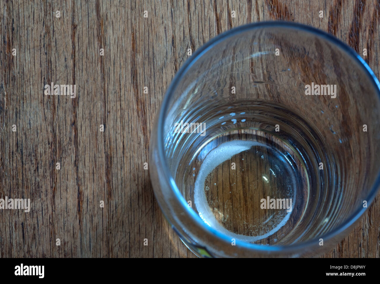 a close up overhead shot of an empty beer glass Stock Photo - Alamy