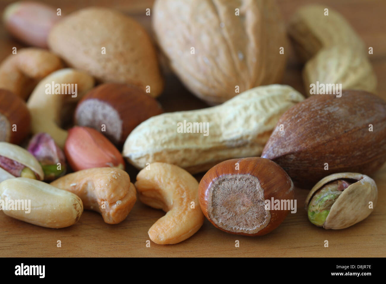 Nuts with and without shell, close up Stock Photo - Alamy