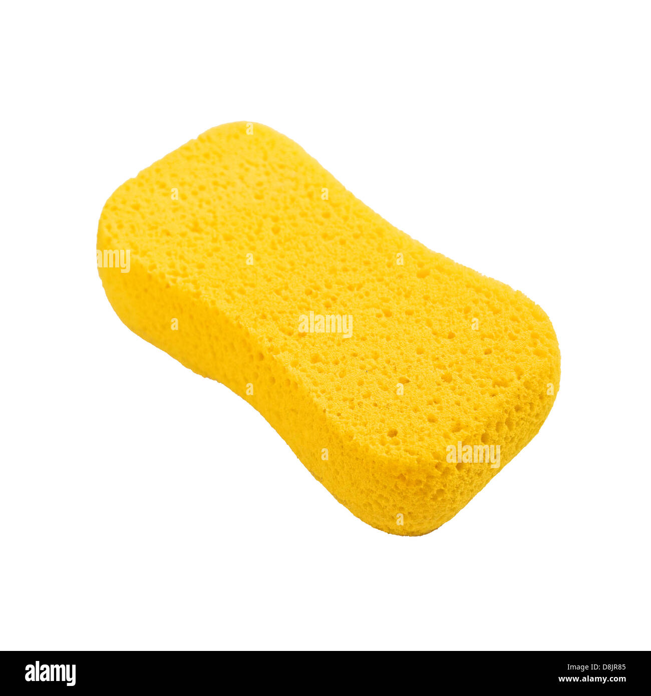 Yellow household sponge over a white background Stock Photo - Alamy