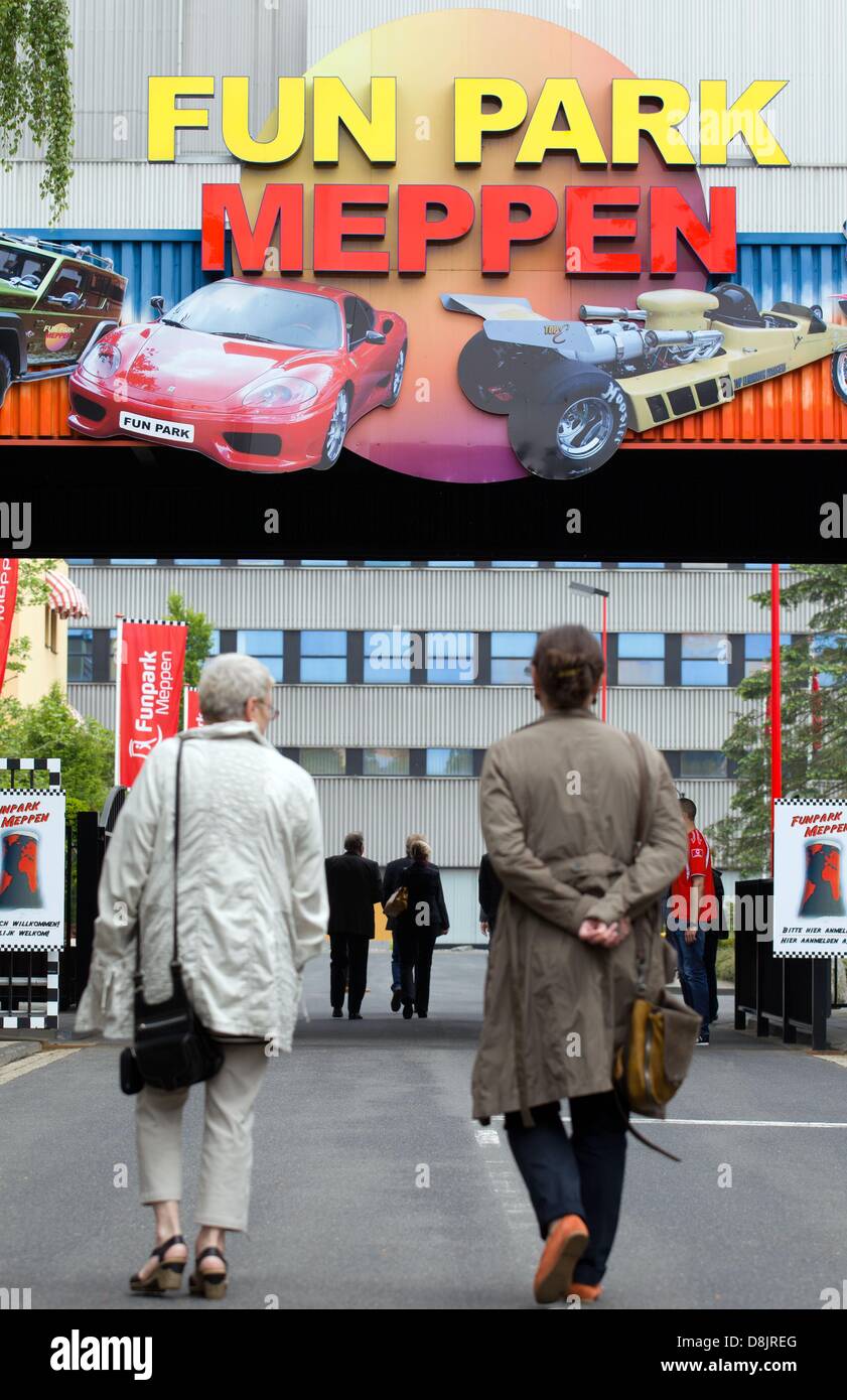 Visitors enter the Funpark in Meppen, Germany, 30 May 2013. The ...