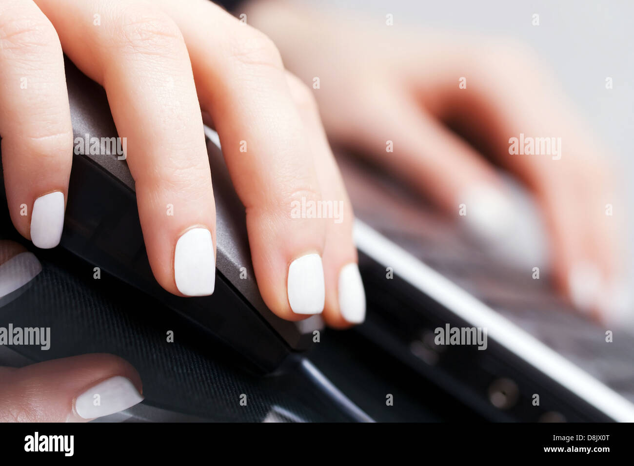 Female hands using laptop Stock Photo - Alamy