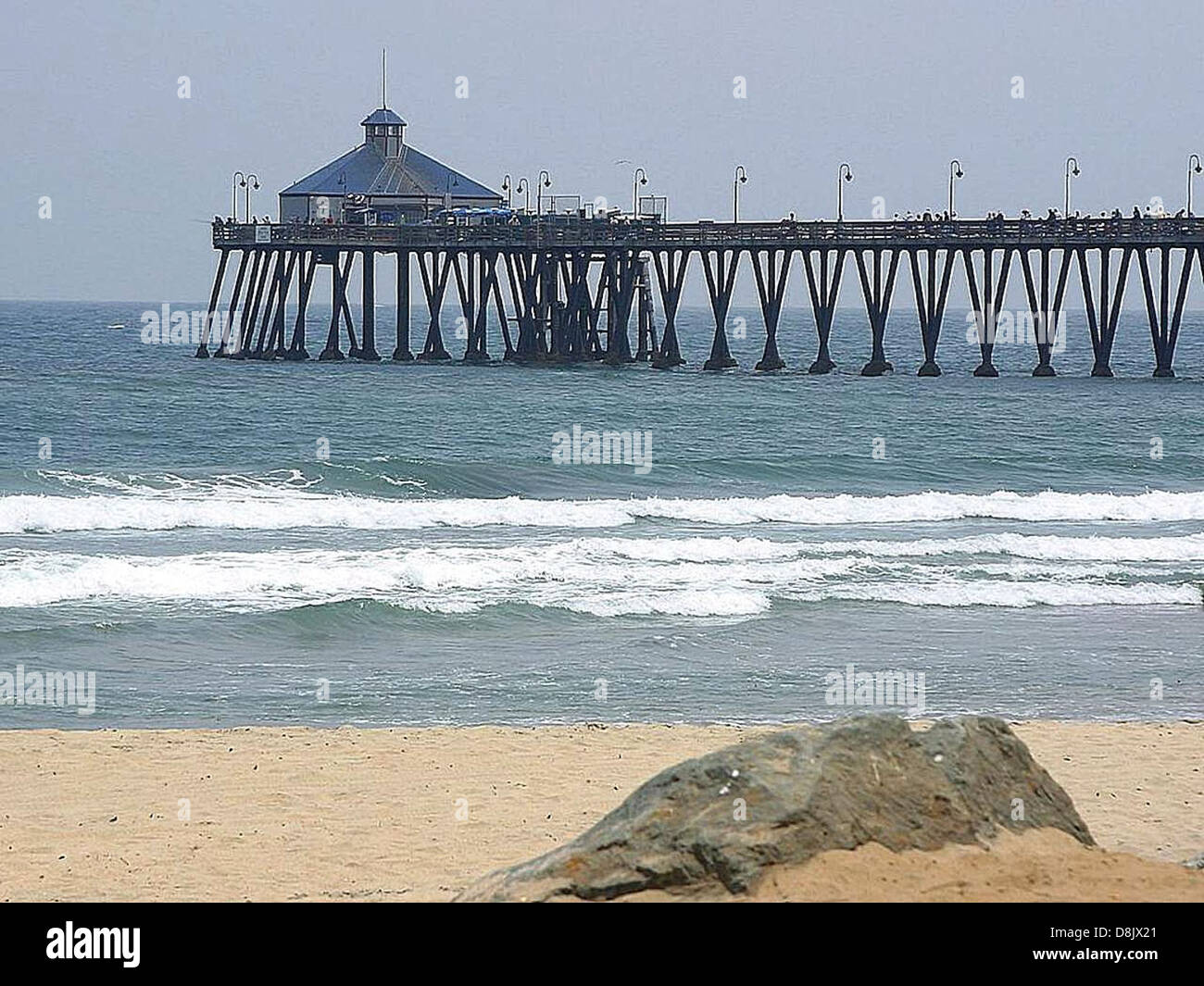 This image shows the pier at Imperial Beach, a popular coastal ...