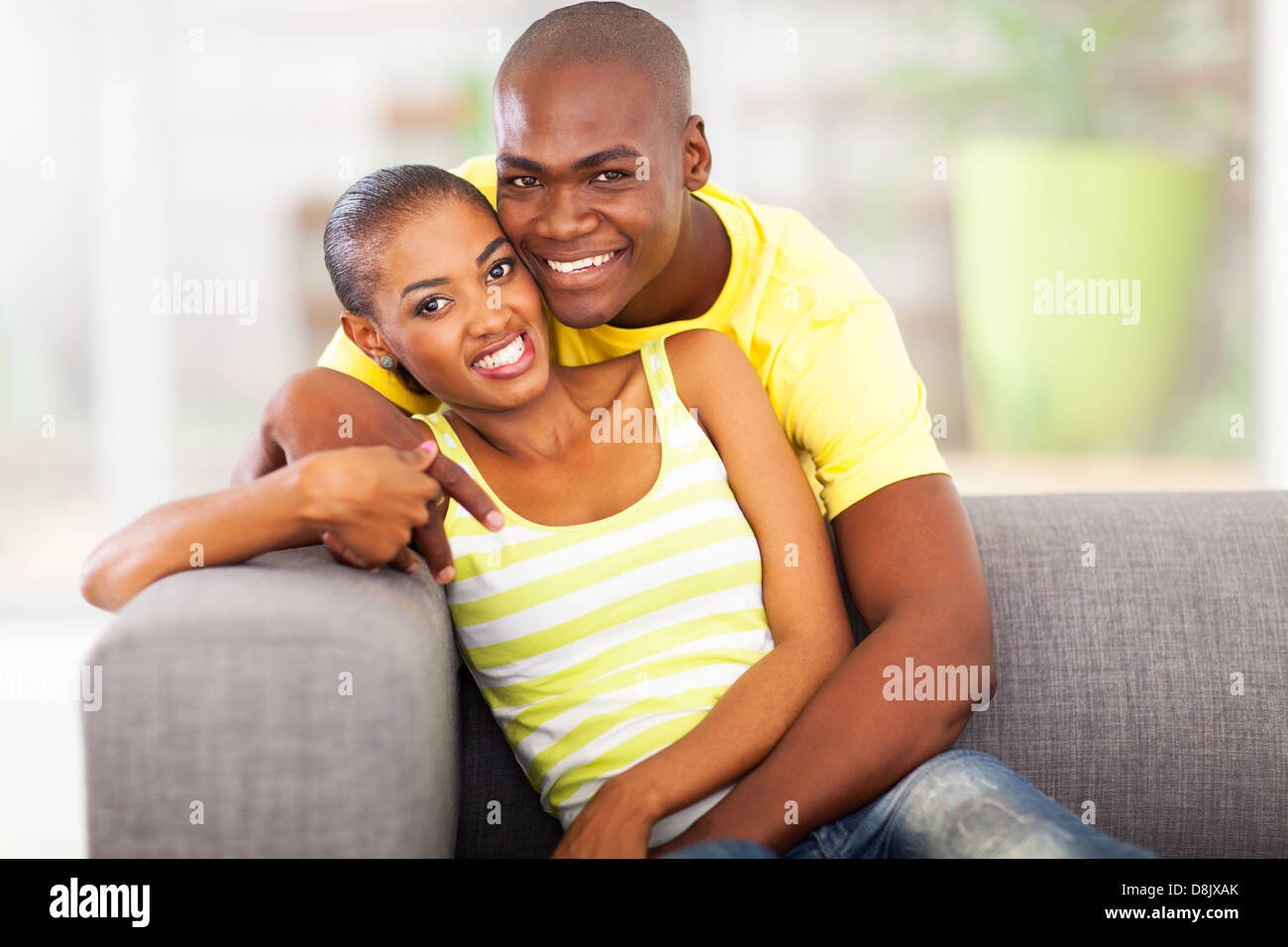 Young black couple embracing hi-res stock photography and images - Alamy