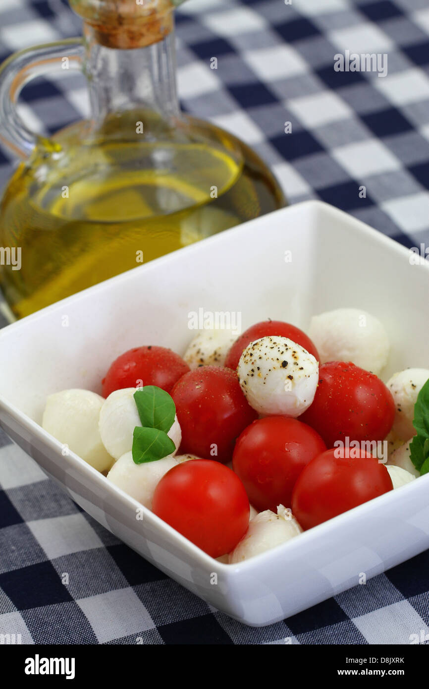 Mozzarella and cherry tomato salad Stock Photo - Alamy