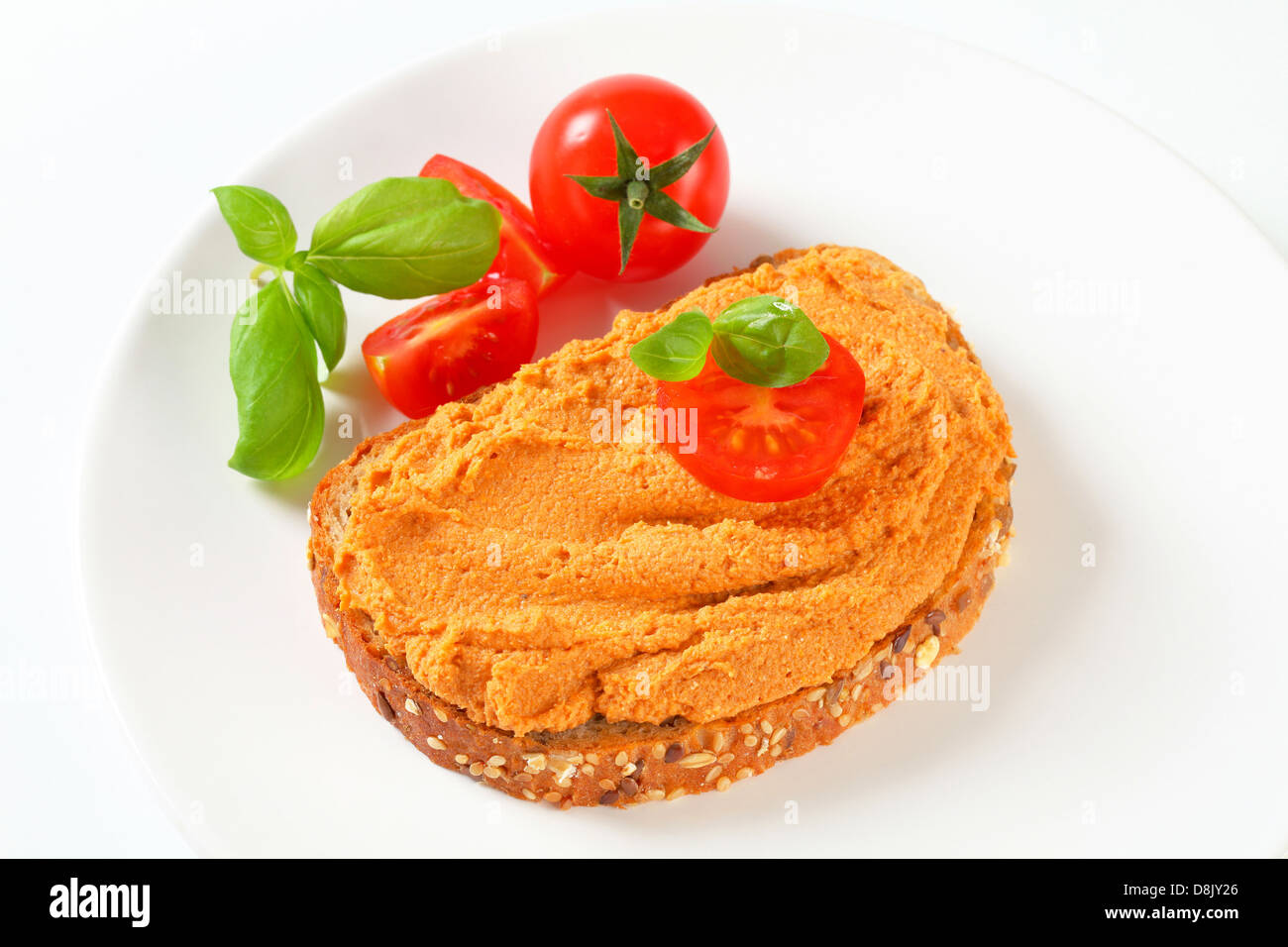 Whole grain bread with vegetable spread Stock Photo - Alamy