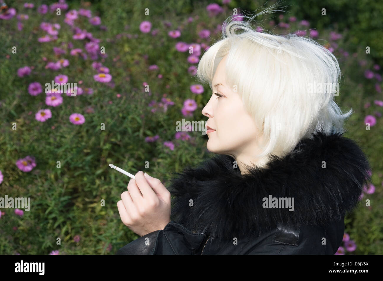 Woman smoking cigarette forest hi-res stock photography and images - Alamy