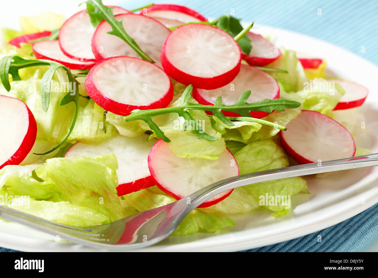 Green salad with sliced radish Stock Photo - Alamy
