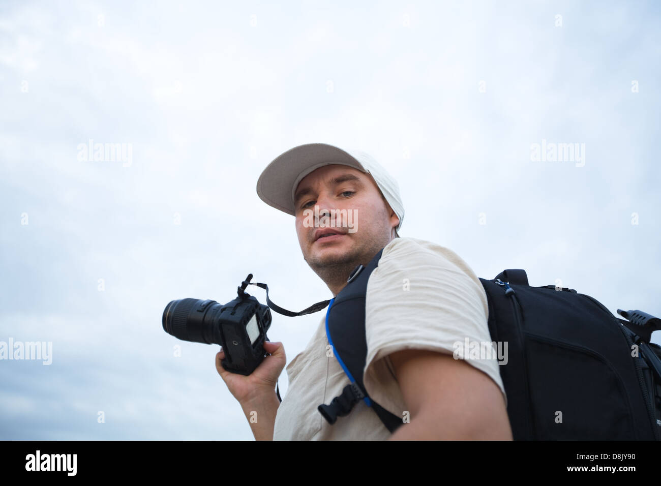 Photographer with camera Stock Photo - Alamy