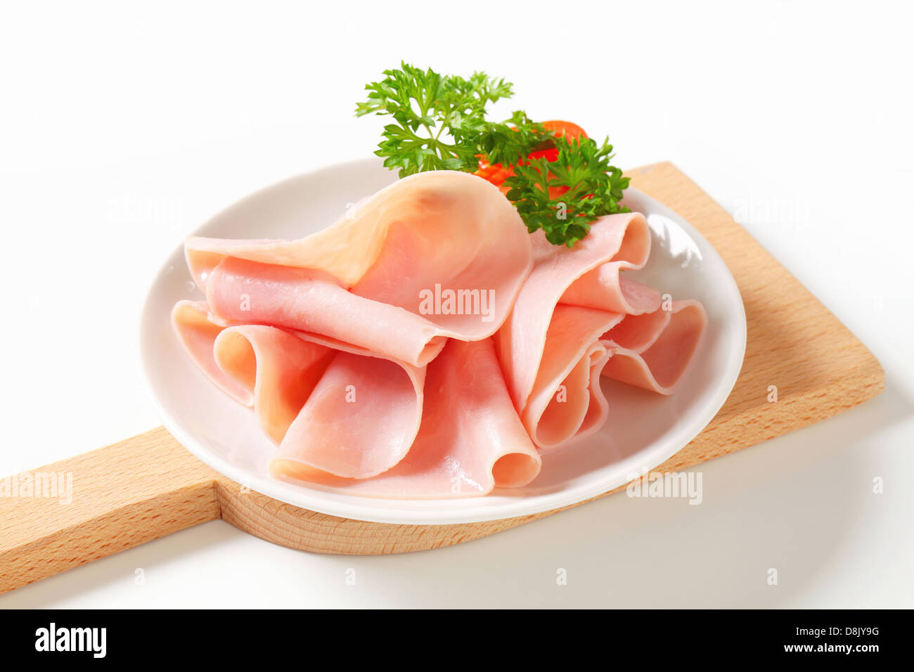 Thinly sliced ham - studio shot Stock Photo - Alamy