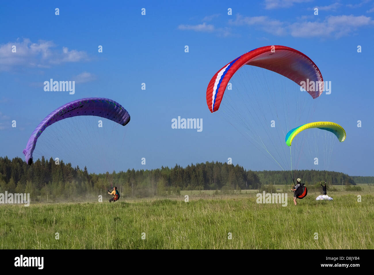 three colour paraglide Stock Photo - Alamy