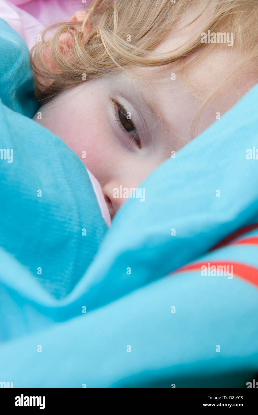 Little girl napping with blanket, close-up Stock Photo - Alamy