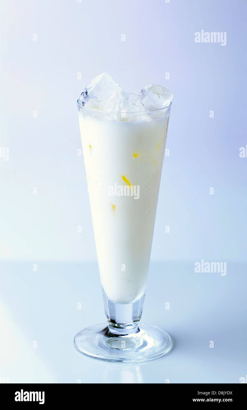 Refreshing milkshake in tall glass Stock Photo - Alamy