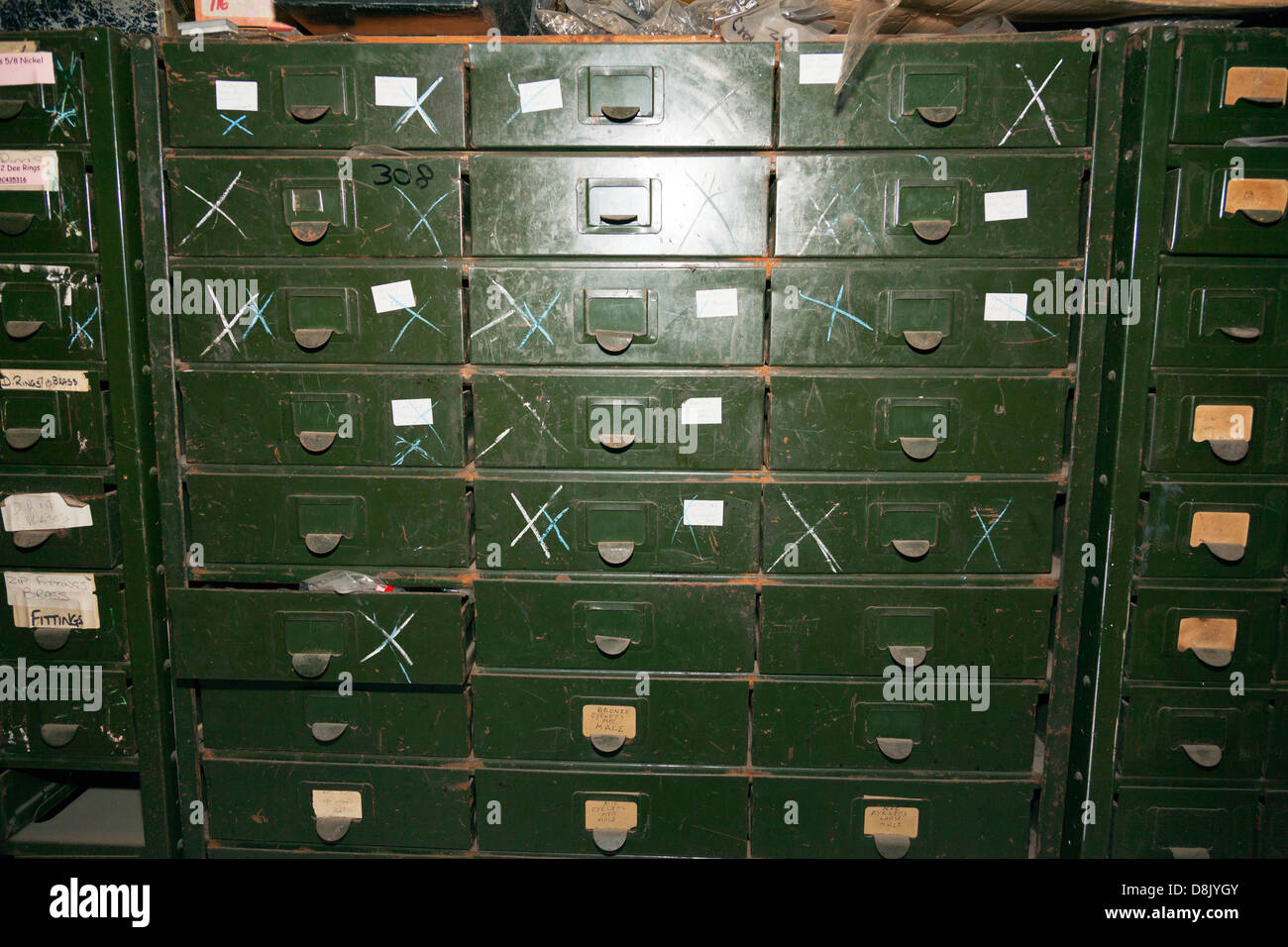 Set of old metal drawers scratched and marked in old Warehouse Stock ...