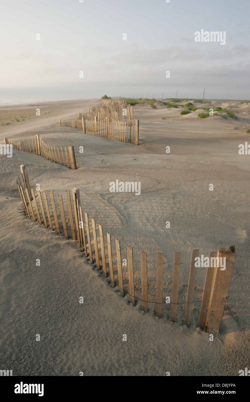 A beach restoration project to prevent erosion. Measures such as sand ...