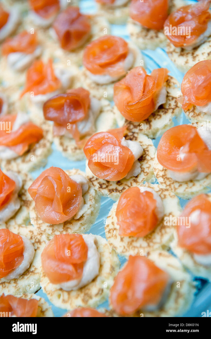 Smoked salmon on blinis Stock Photo - Alamy