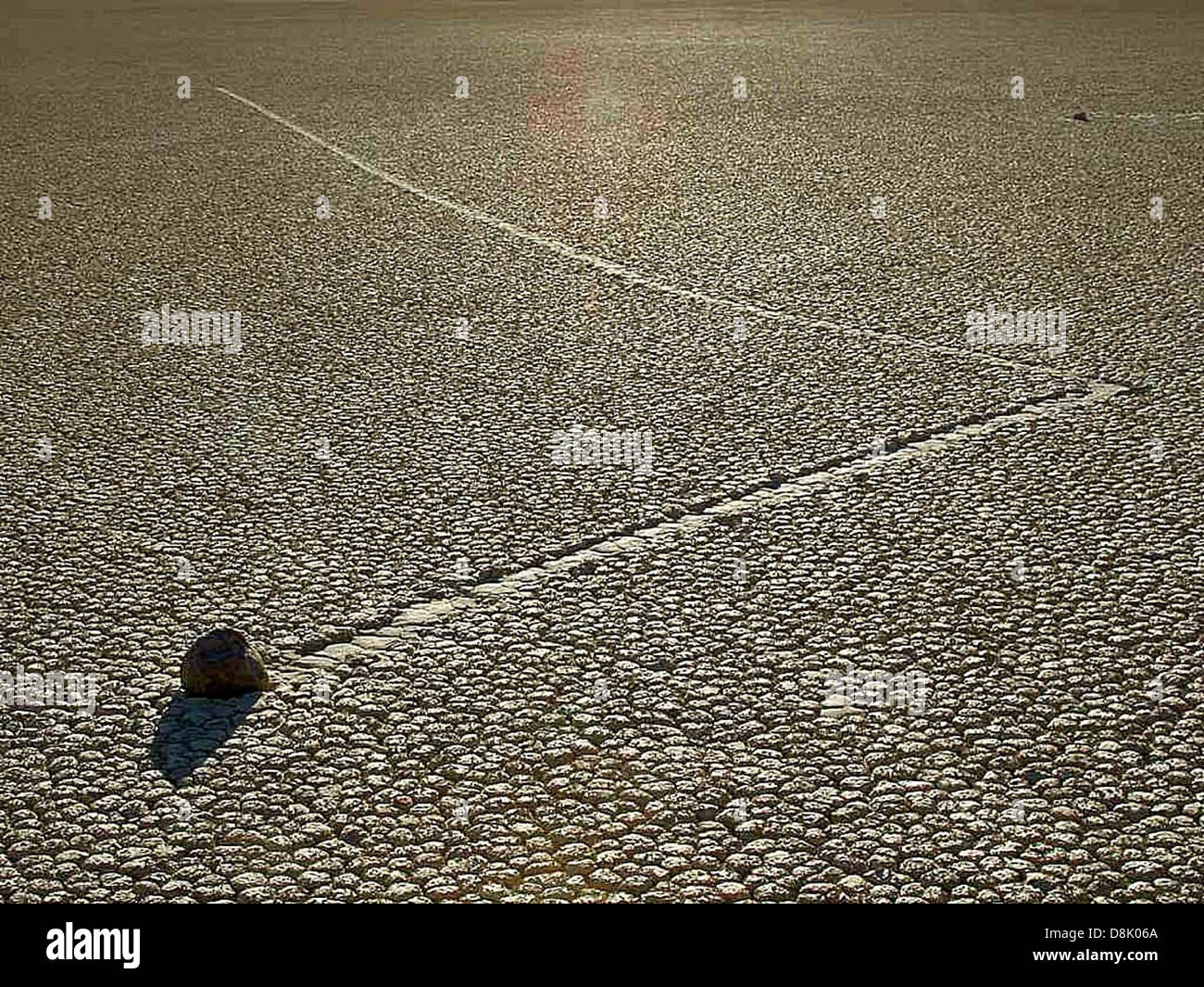 Rocks positioned along the edge of a racetrack, providing a natural ...