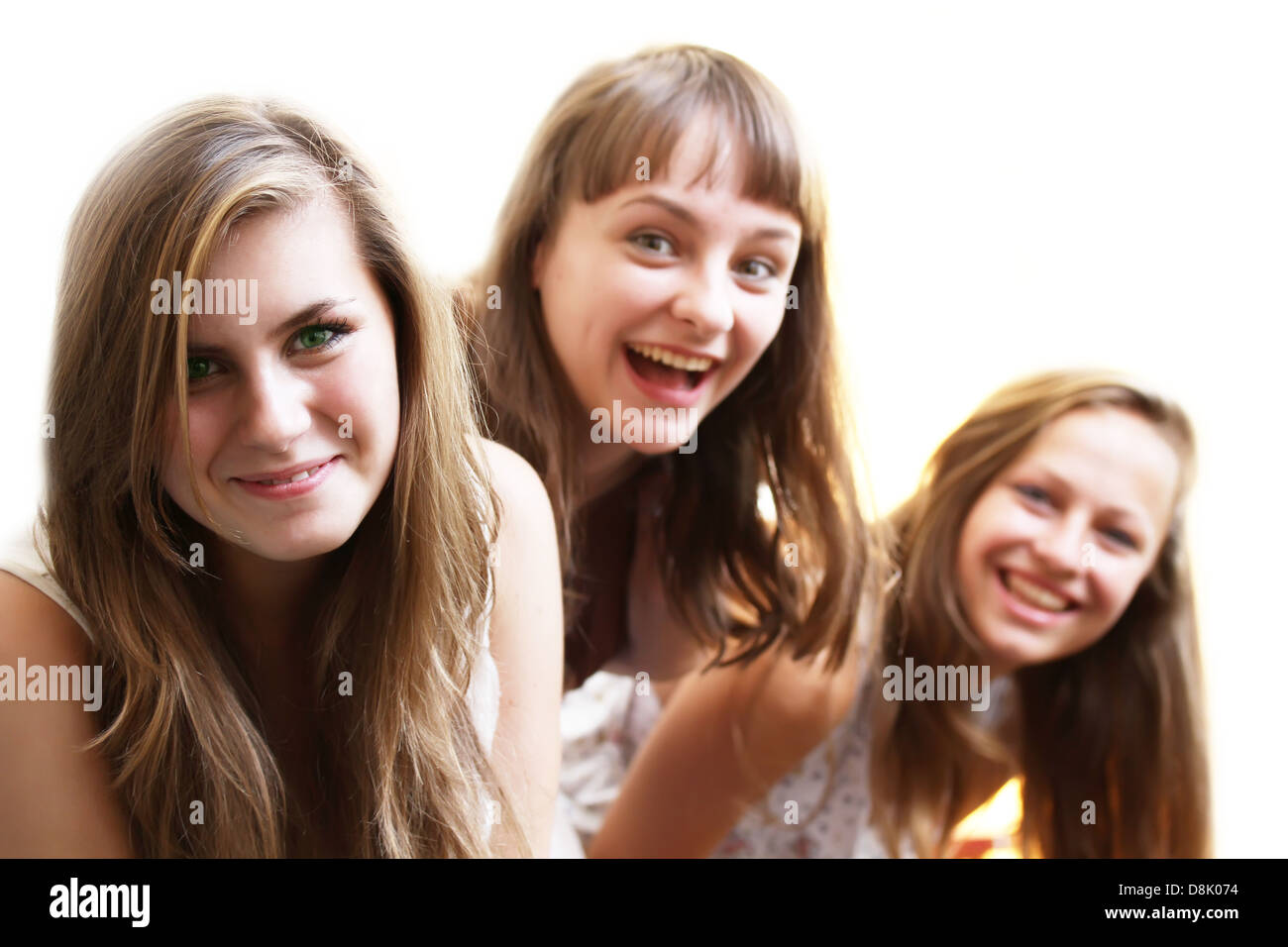 Beautiful girls smiling on white background Stock Photo - Alamy