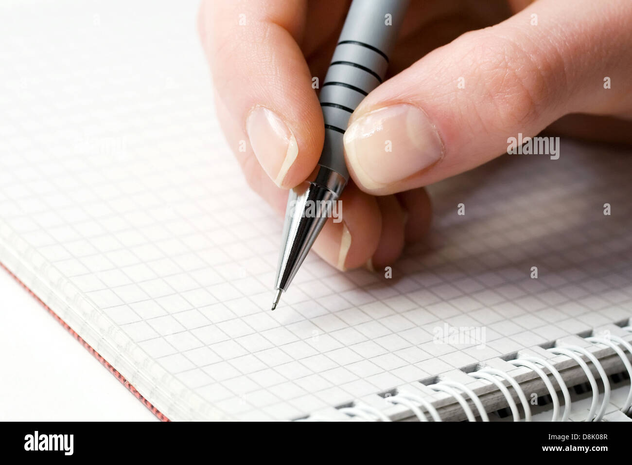 Female hand writing Stock Photo - Alamy