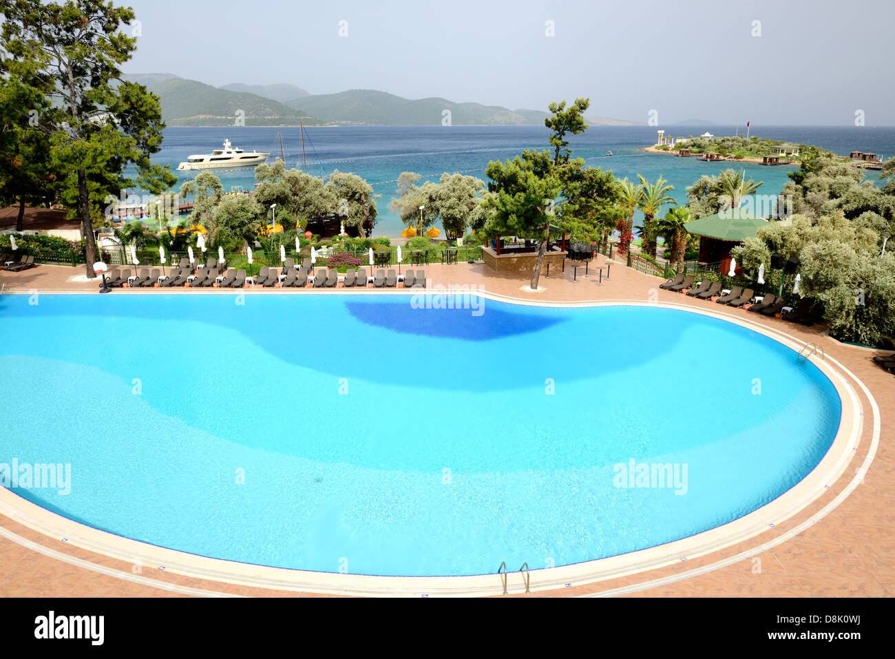 Swimming pool and yacht at the pier on Mediterranean turkish resort ...