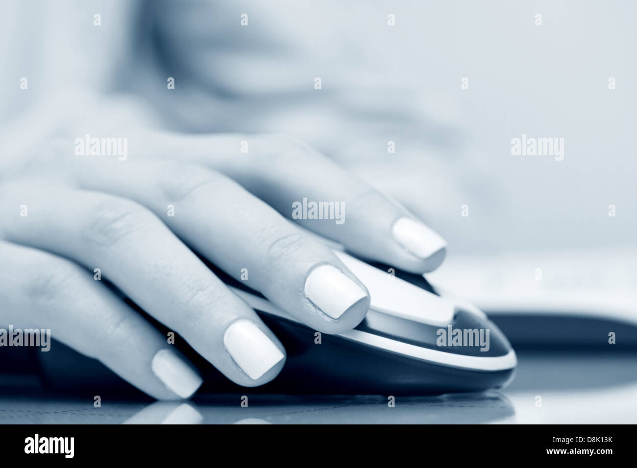 Female hand holding computer mouse Stock Photo - Alamy