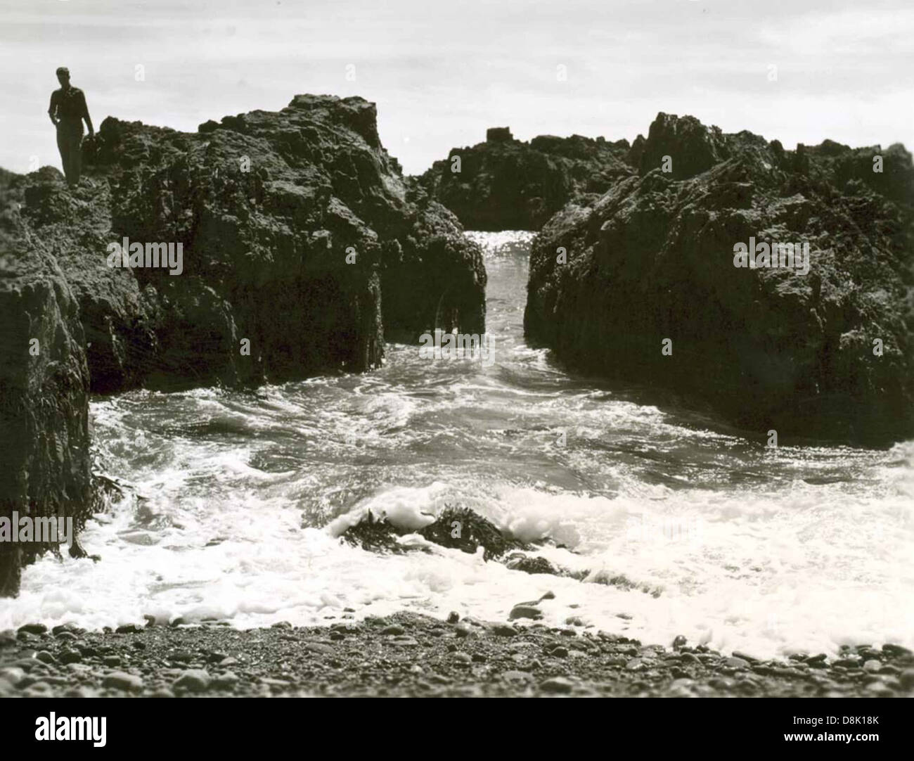 Rocks and water at island shoreline Stock Photo - Alamy